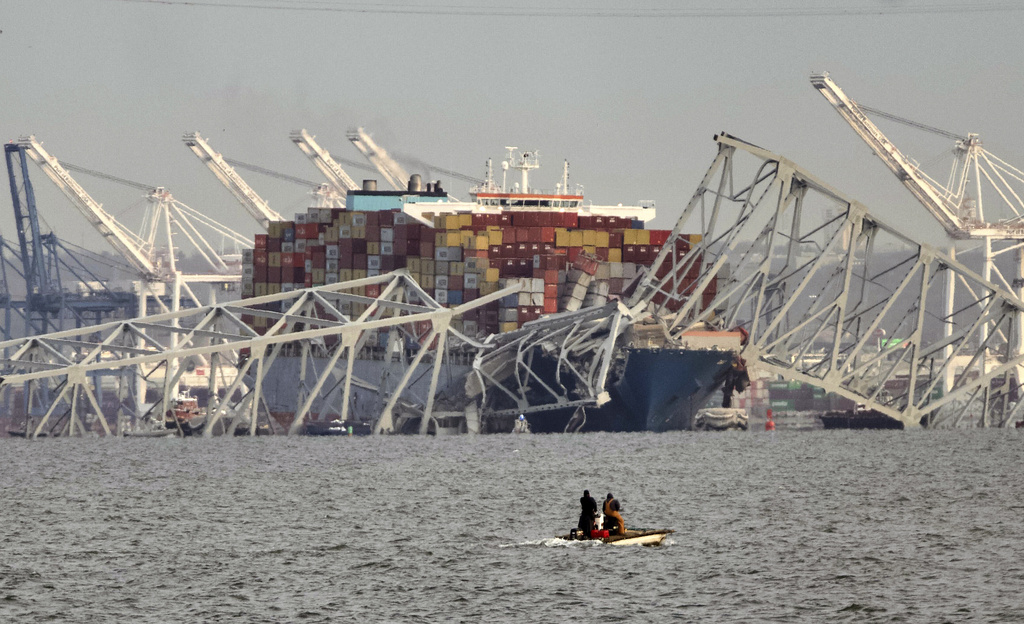 Cargo ship hits Baltimore’s Key Bridge, bringing it down. Rescuers are ...